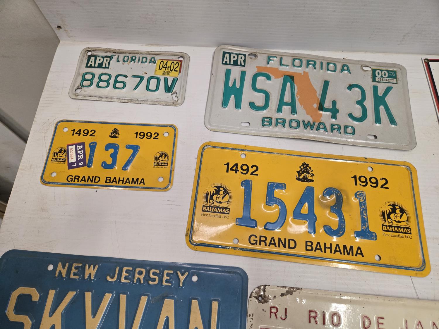 Qty of License Plates & Various Signs - 26AA | Team Auctions